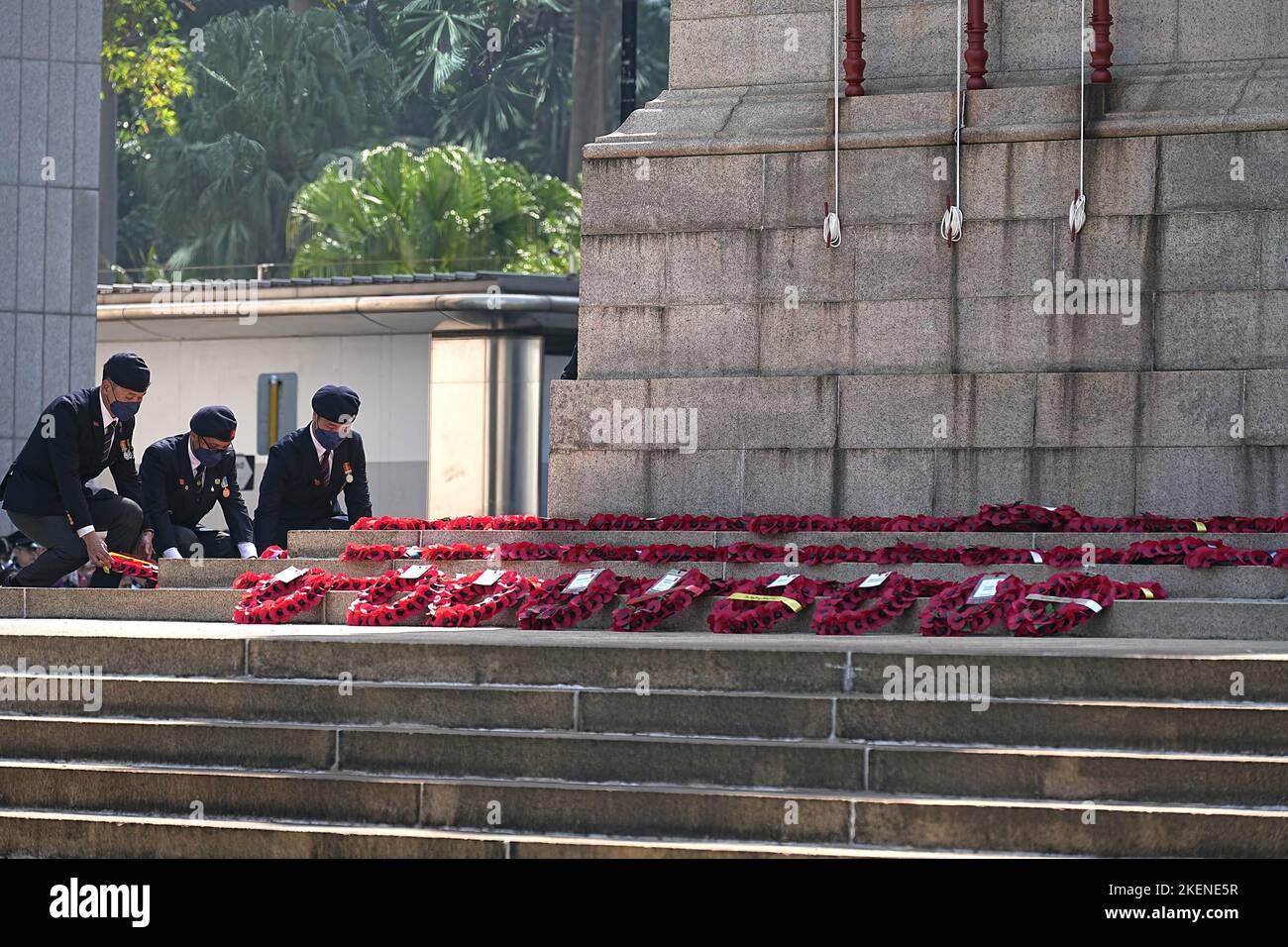 People lay wreaths in front of the Cenotaph during the remembrance day ...