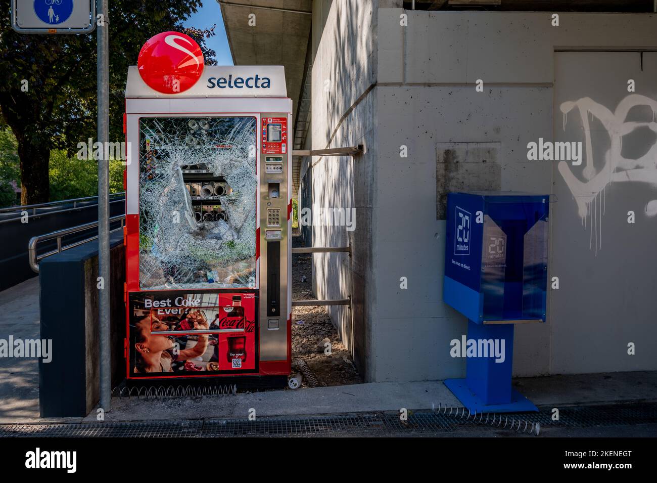 Damaged vending machine. Broken glass. Violence concept. Lausanne ...