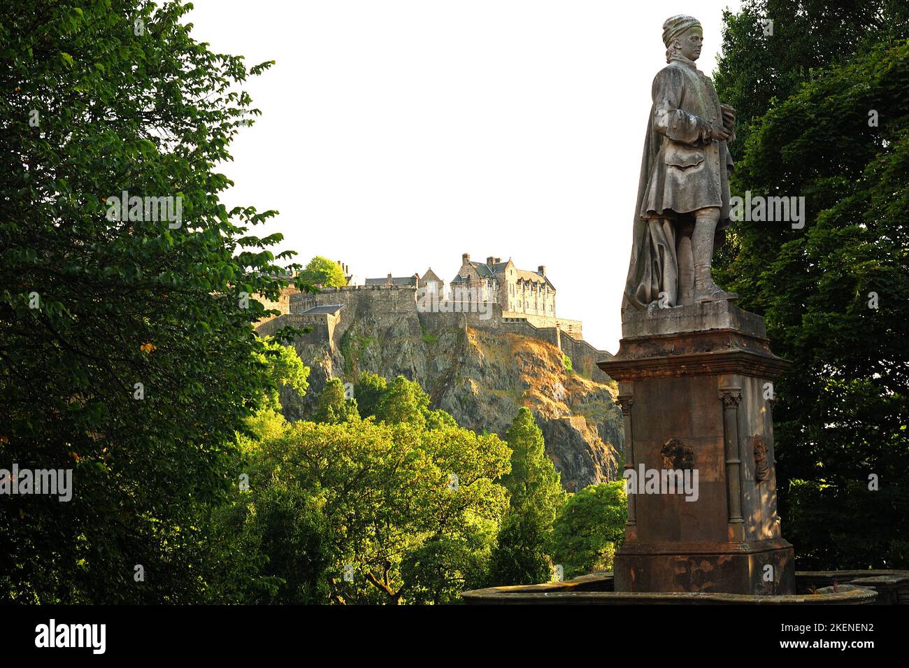 The Edinburgh Castle and a statue of the Scottish painter Allan Ramsay ...