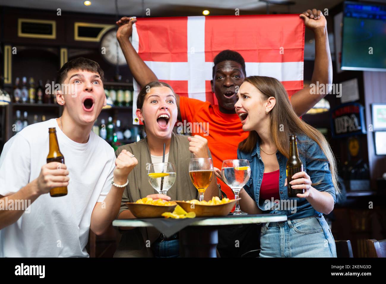 Danish fans scream with joy in beer bar. Denmark win Stock Photo - Alamy