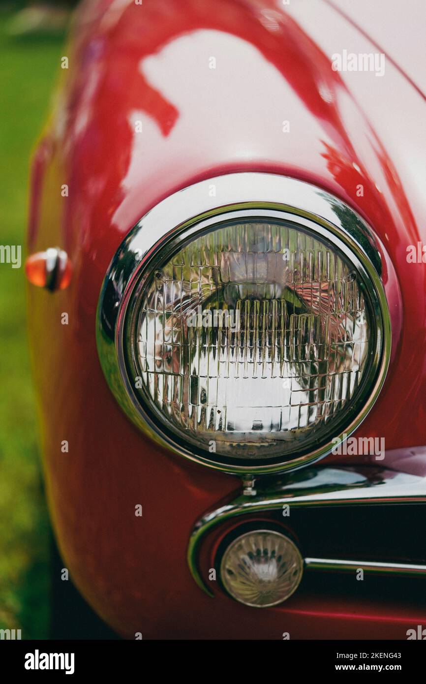 Color close up of a red vintage car headlight and turn signal Stock ...