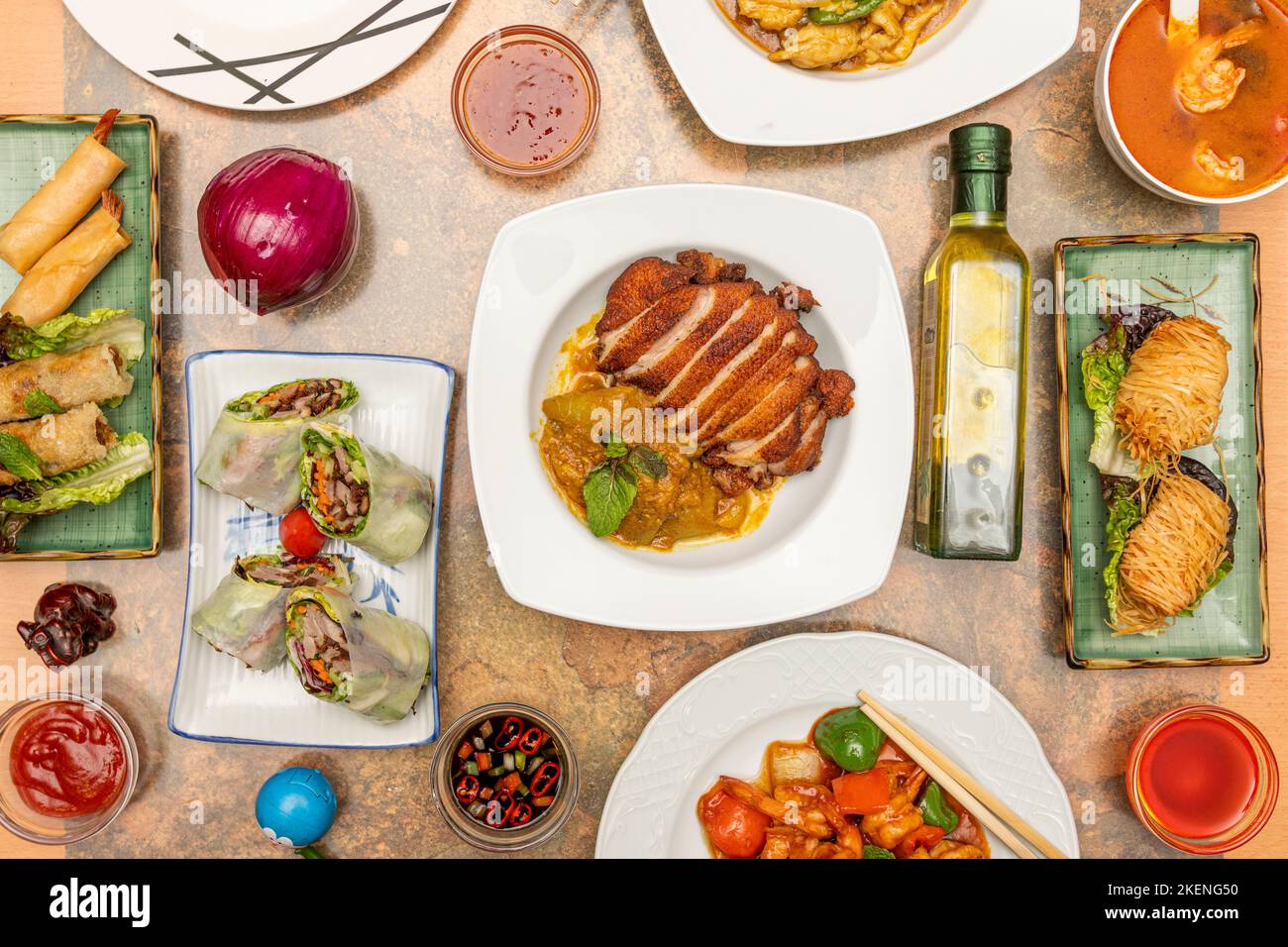 Dishes with great Asian recipes, fried Vietnamese rolls, beef noodles ...