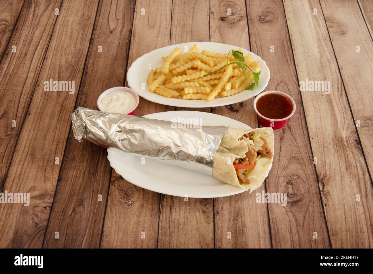 A Pakistani kebab restaurant menu with stuffed durum and curly fries ...