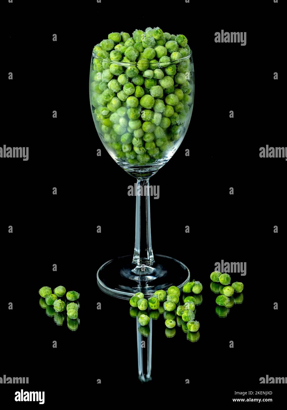 Delicious peas in a wine glass closeup macro Stock Photo - Alamy