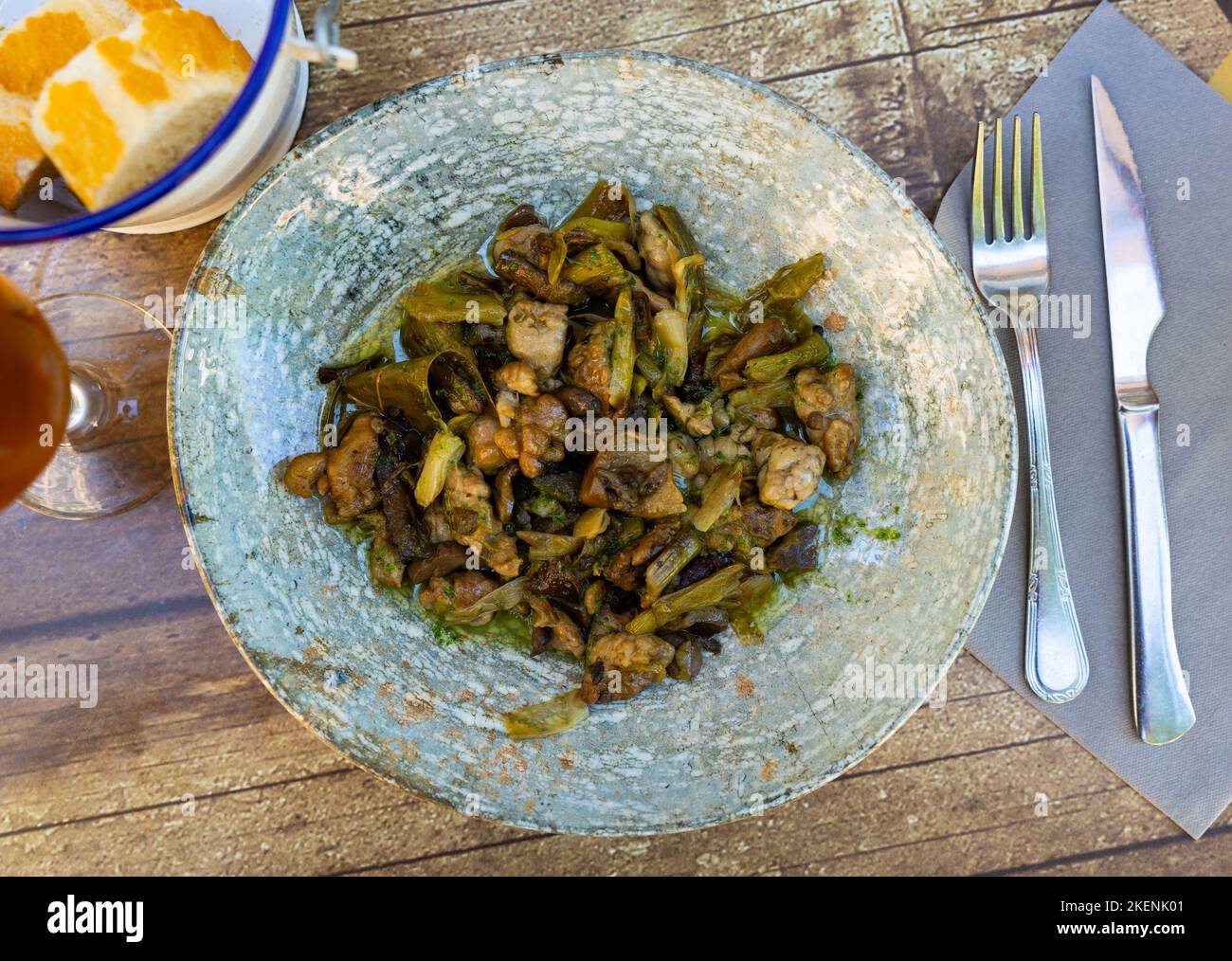Lechecillas de ternasco. Roasted lamb gizzards served with stewed ...