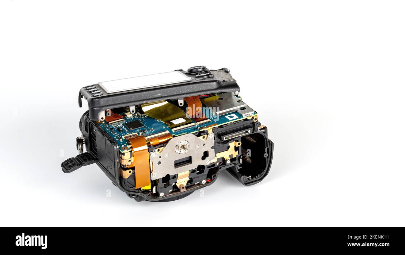 Repair has broken a digital camera down with electronics exposed Stock ...