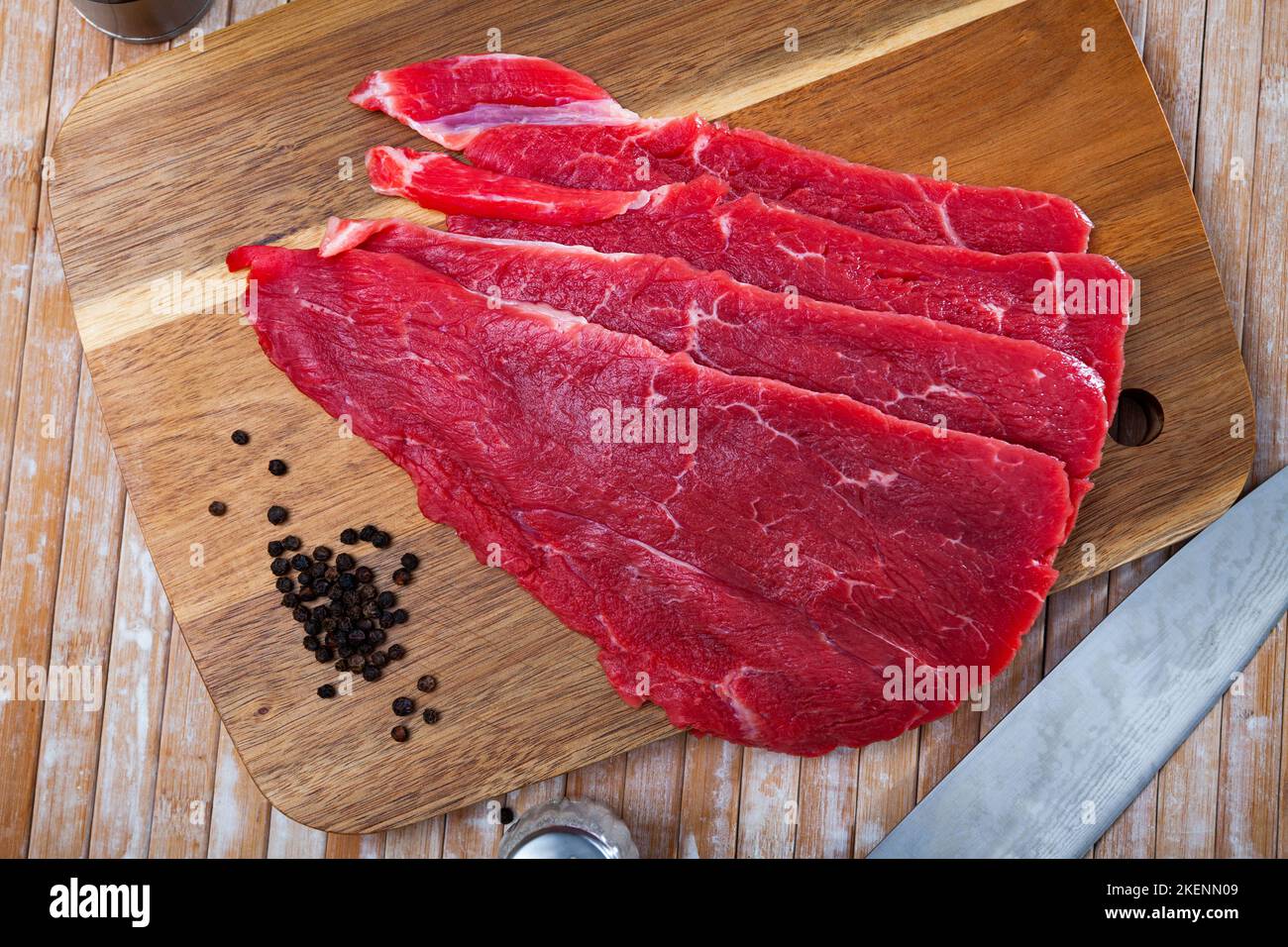 Image of raw a beef fillet cut into pieces Stock Photo - Alamy
