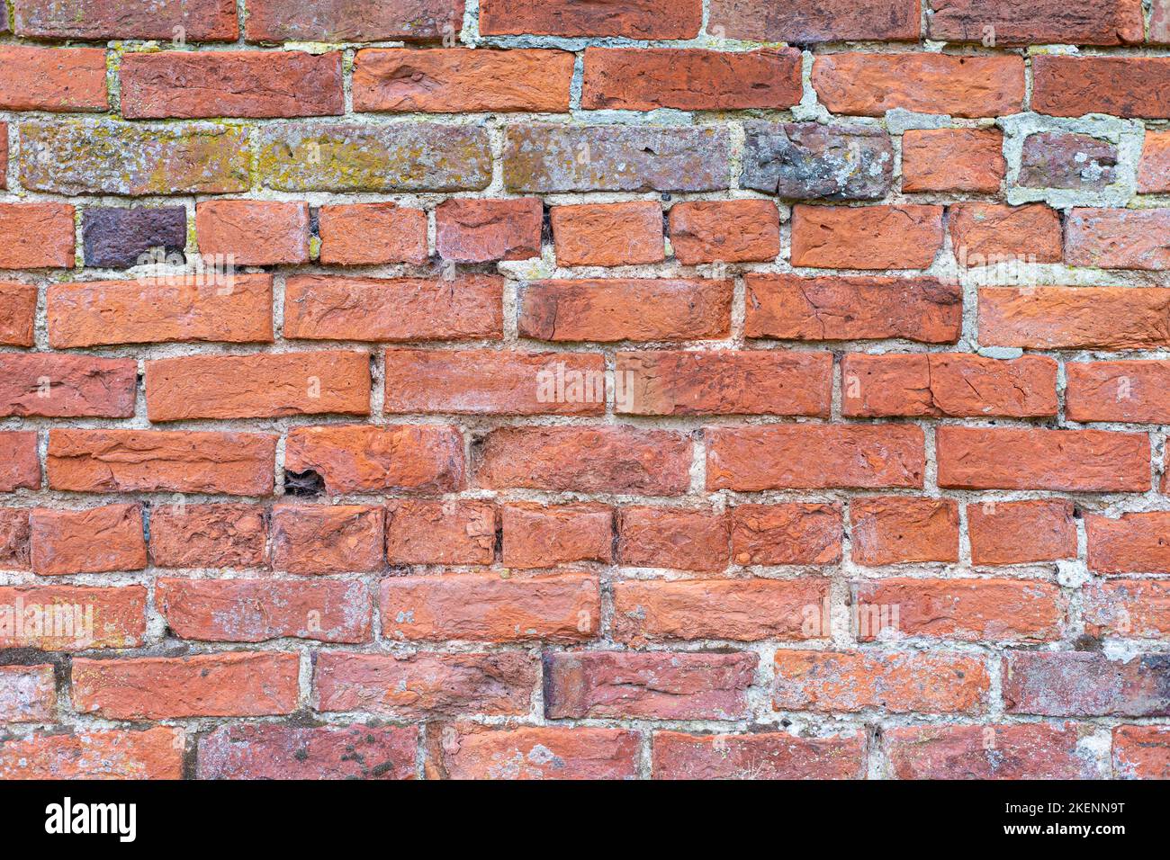 Coursed masonry construction of old, mostly red bricks. Suitable as a ...