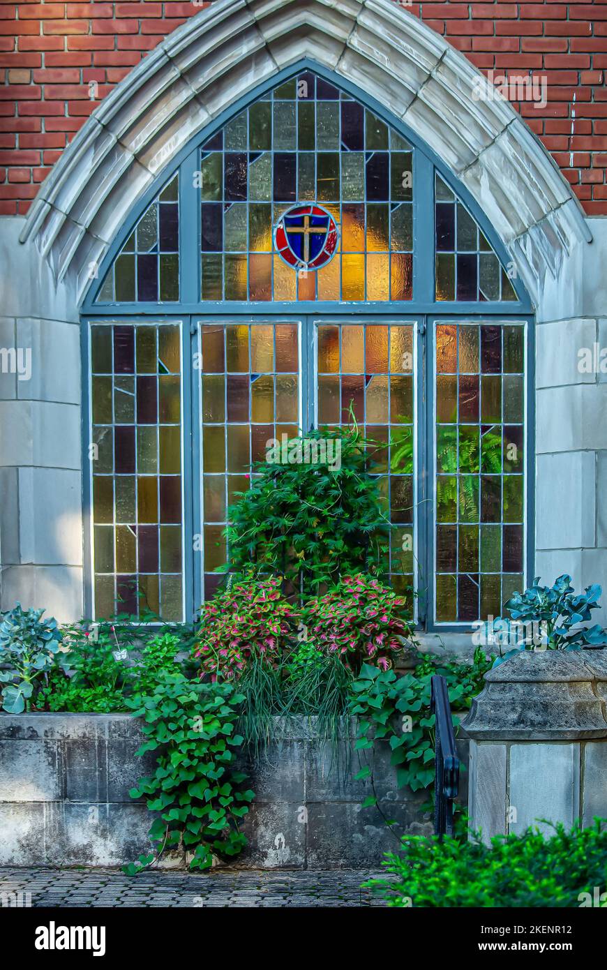 The stained glass window of an old church building in Willoughby, Ohio ...