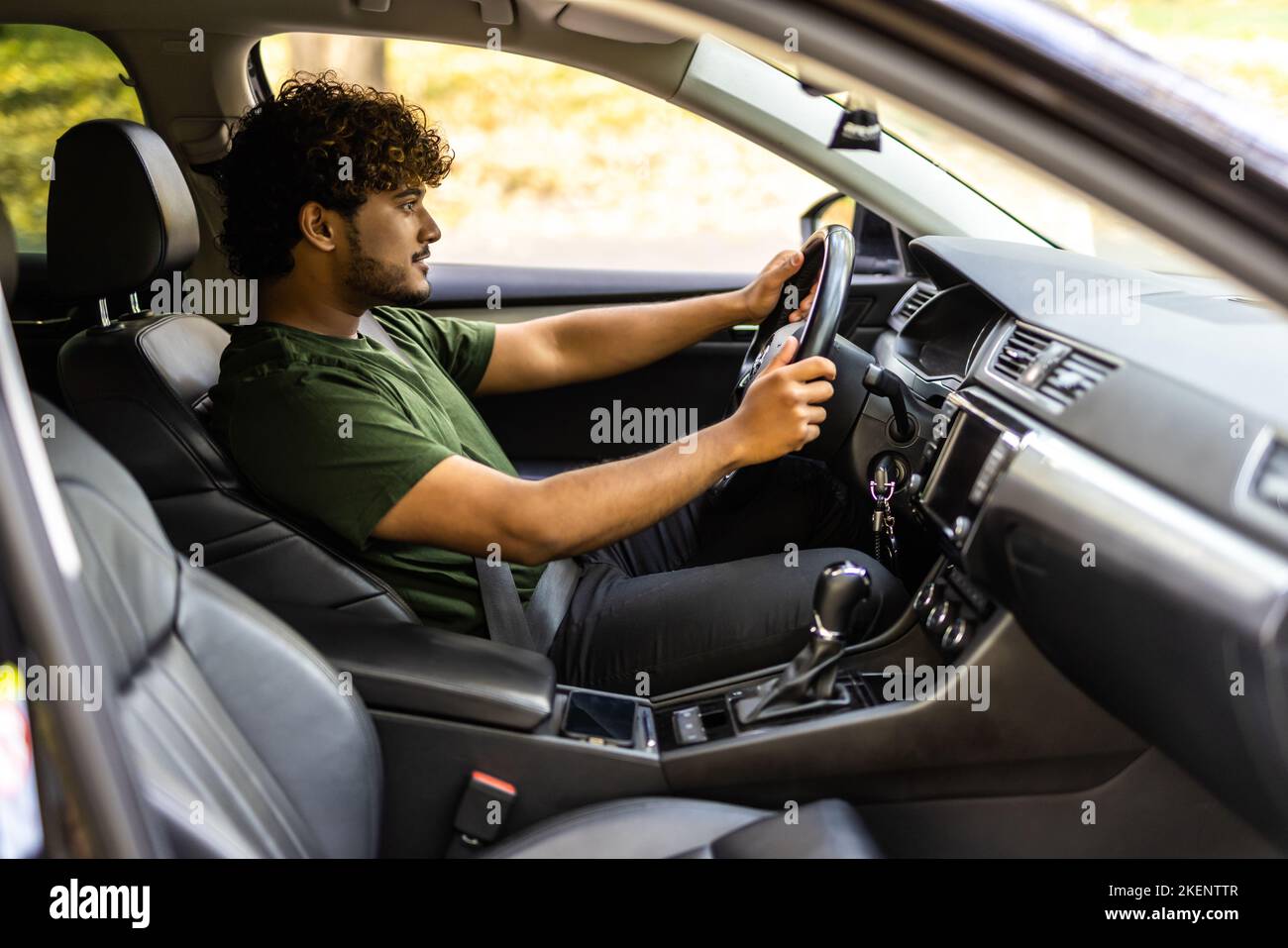 Young asian man driving car Stock Photo - Alamy