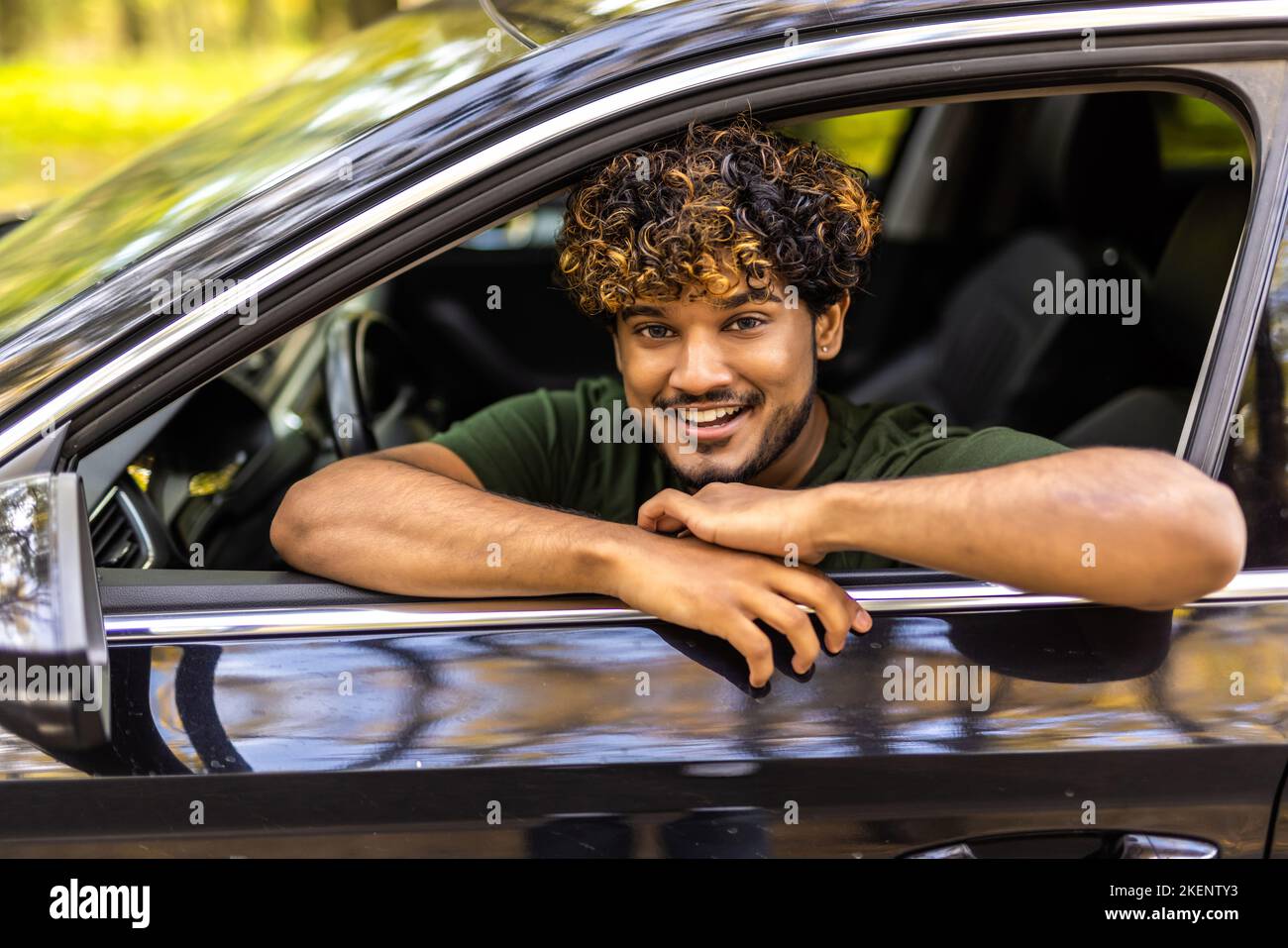 Young asian man driving car Stock Photo - Alamy