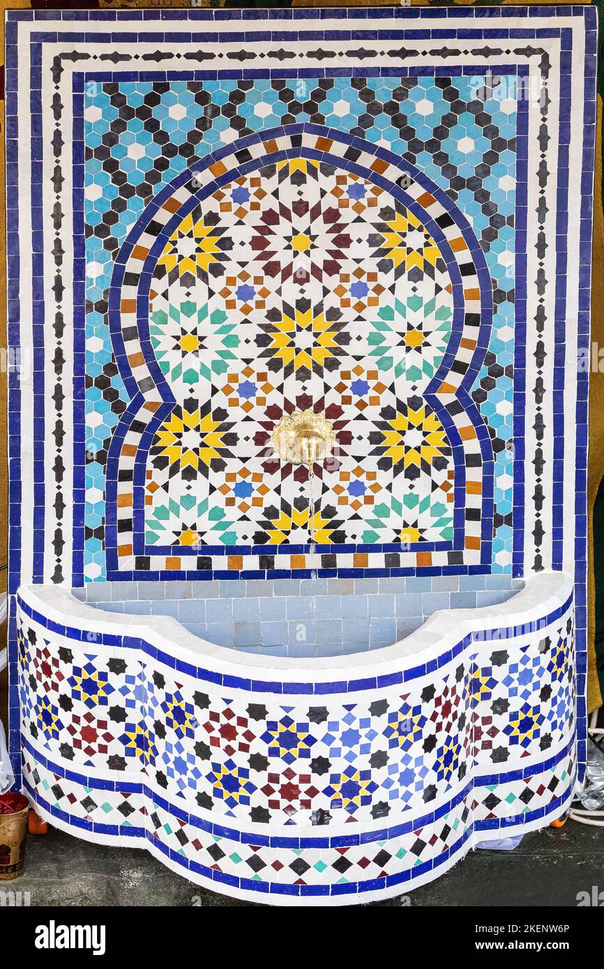 vertical view of a small moroccan mosaic fountain to decorate gardens ...