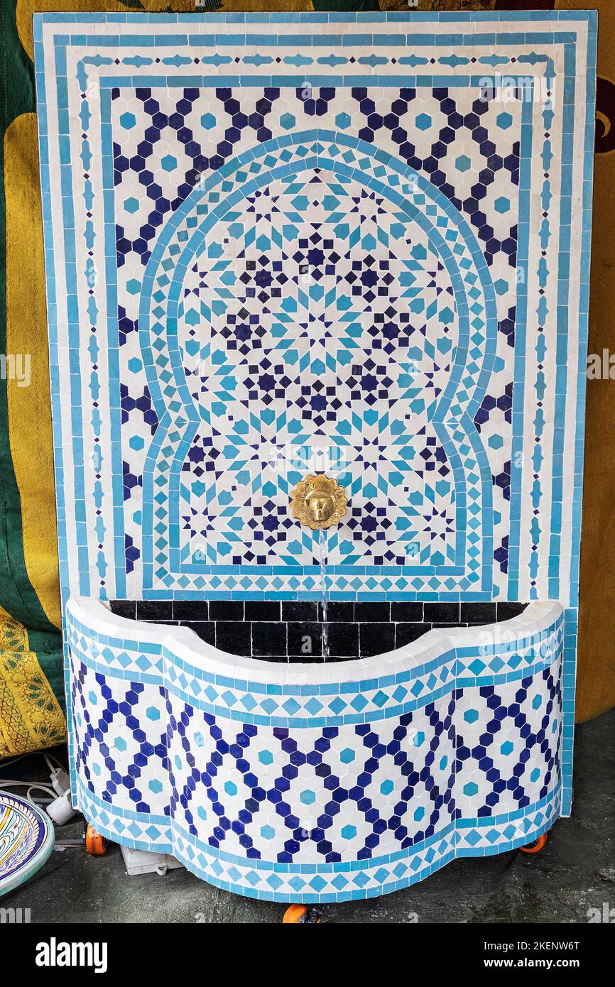vertical view of a small moroccan mosaic fountain to decorate gardens ...