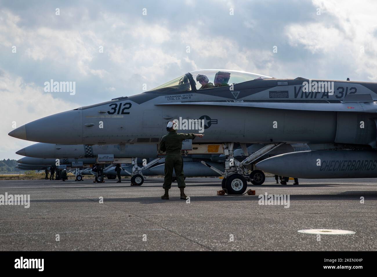 A U.S. Marine Corps F/A-18C Hornet aircraft with Marine Fighter Attack ...