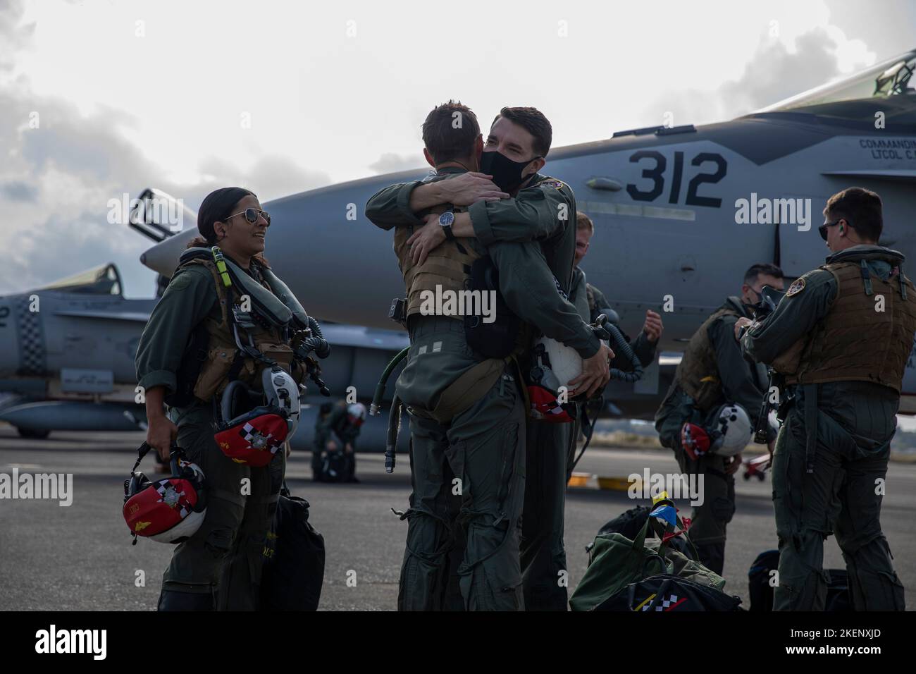 U.S. Marines with Marine Fighter Attack Squadron (VMFA) 312 embrace ...