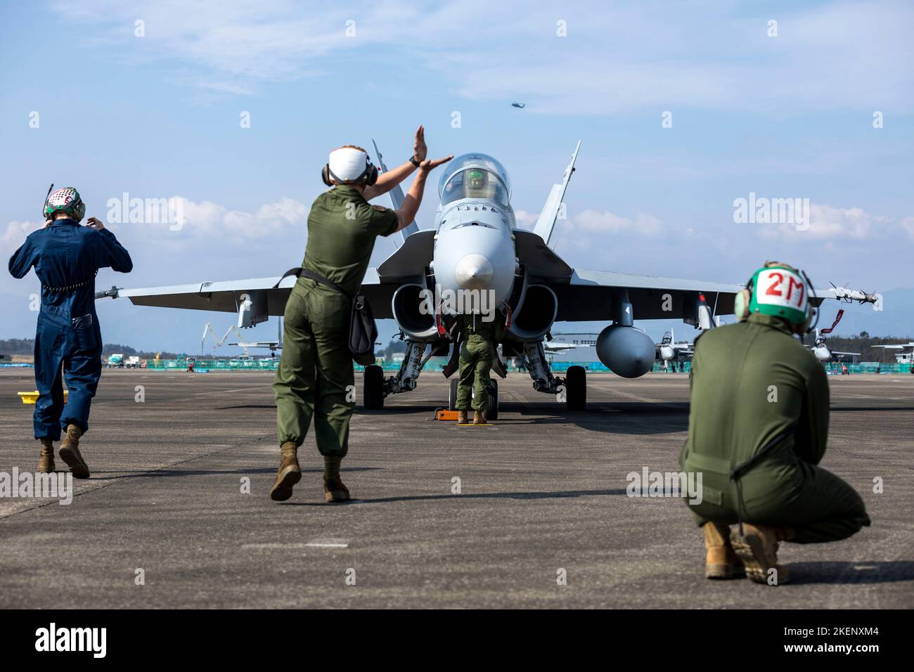 U.S. Marines with Marine Fighter Attack Squadron 312 prepare an F/A-18D ...