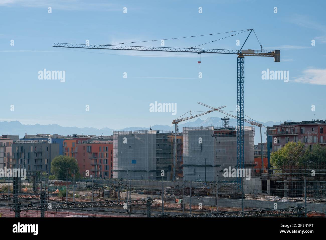 buildings architecture: cranes in the city indicate that the ...