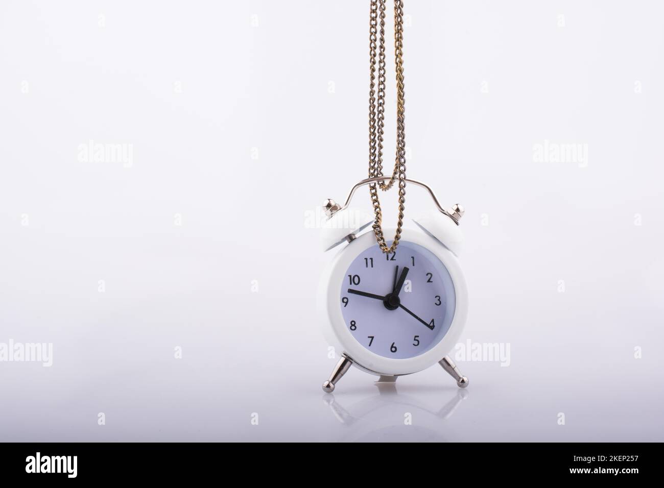 White color alarm clock on white background Stock Photo - Alamy White color alarm clock on white background Stock Photo - Alamy