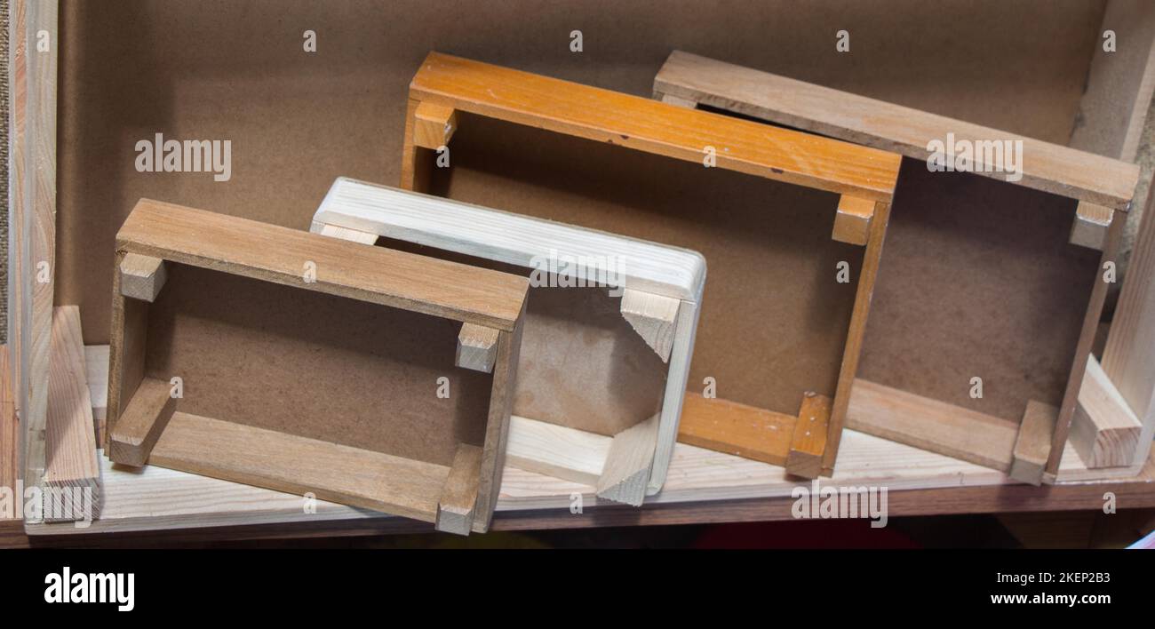 Colorful wooden crate boxes for sale in a market Stock Photo - Alamy