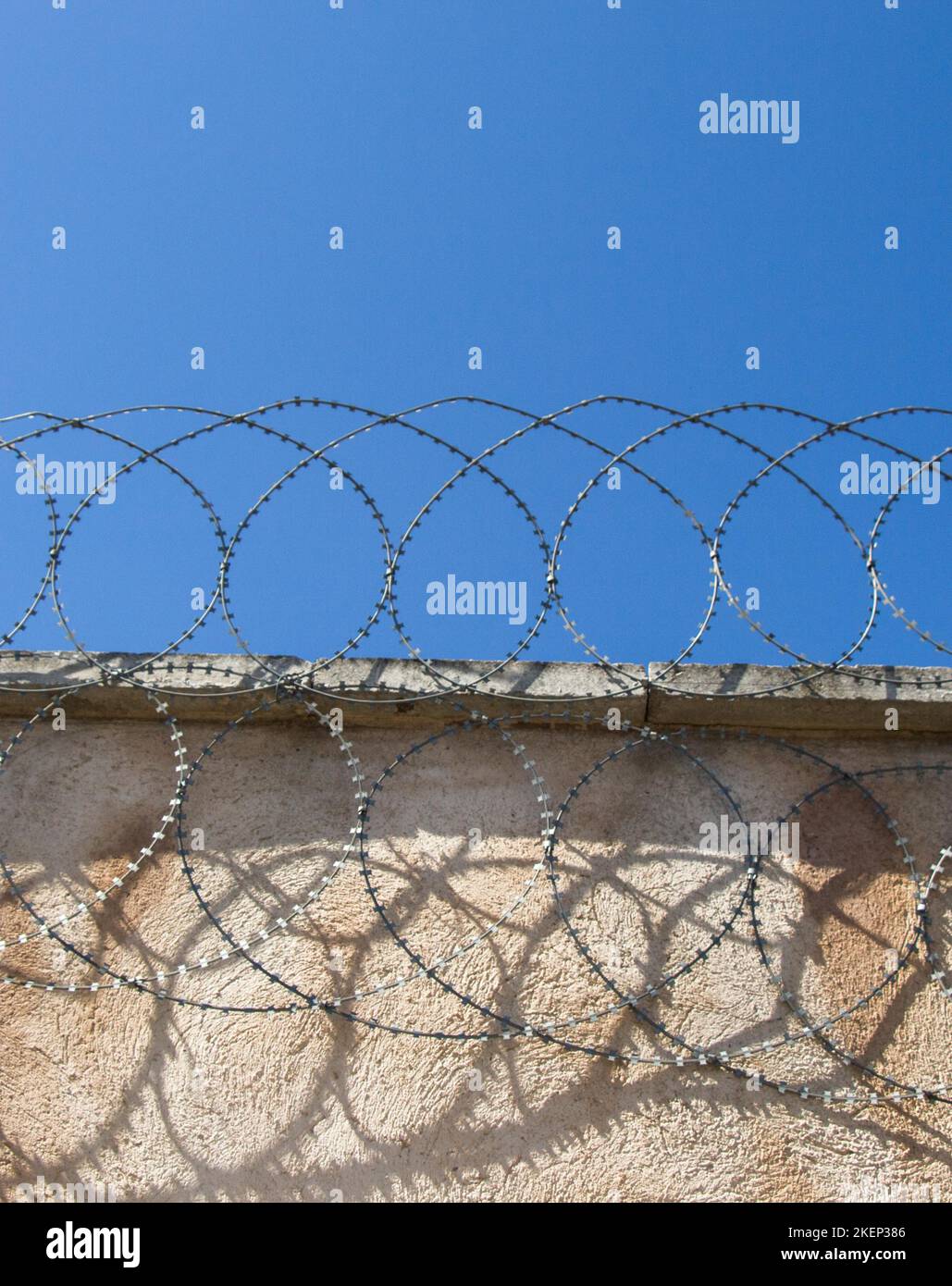 Barbed wire fence used for protection purposes Stock Photo - Alamy