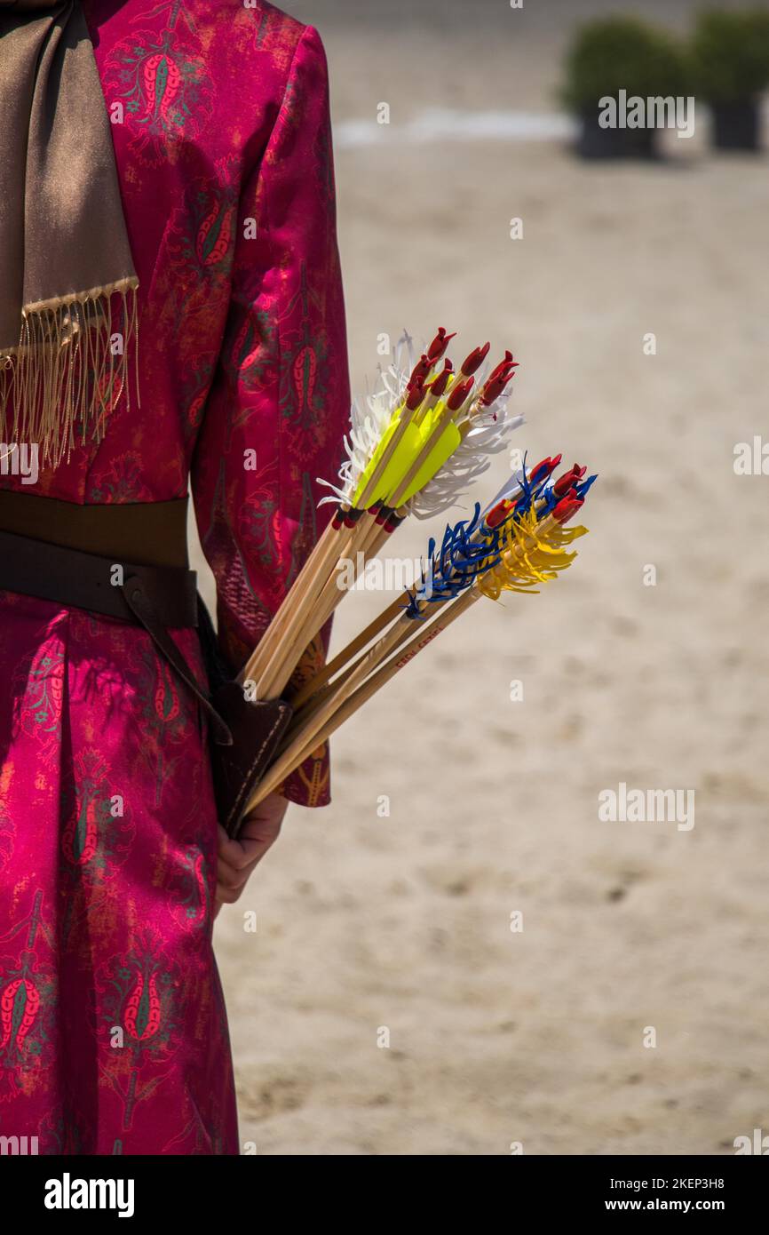 Arrow in hand as rprojectile weapon system archery Stock Photo - Alamy