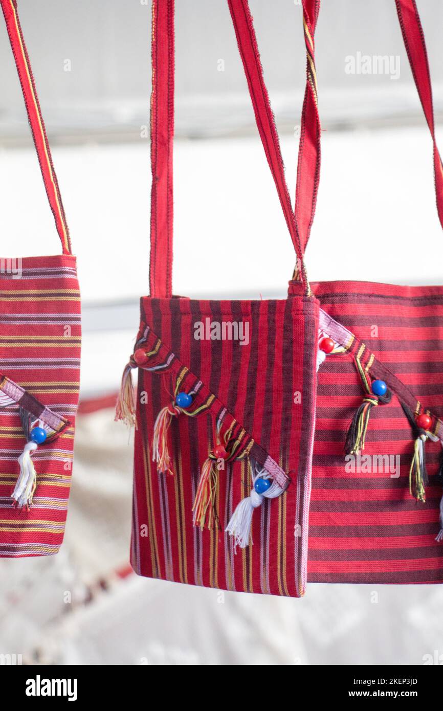 Traditional style handmade woven bags made of fabric Stock Photo - Alamy