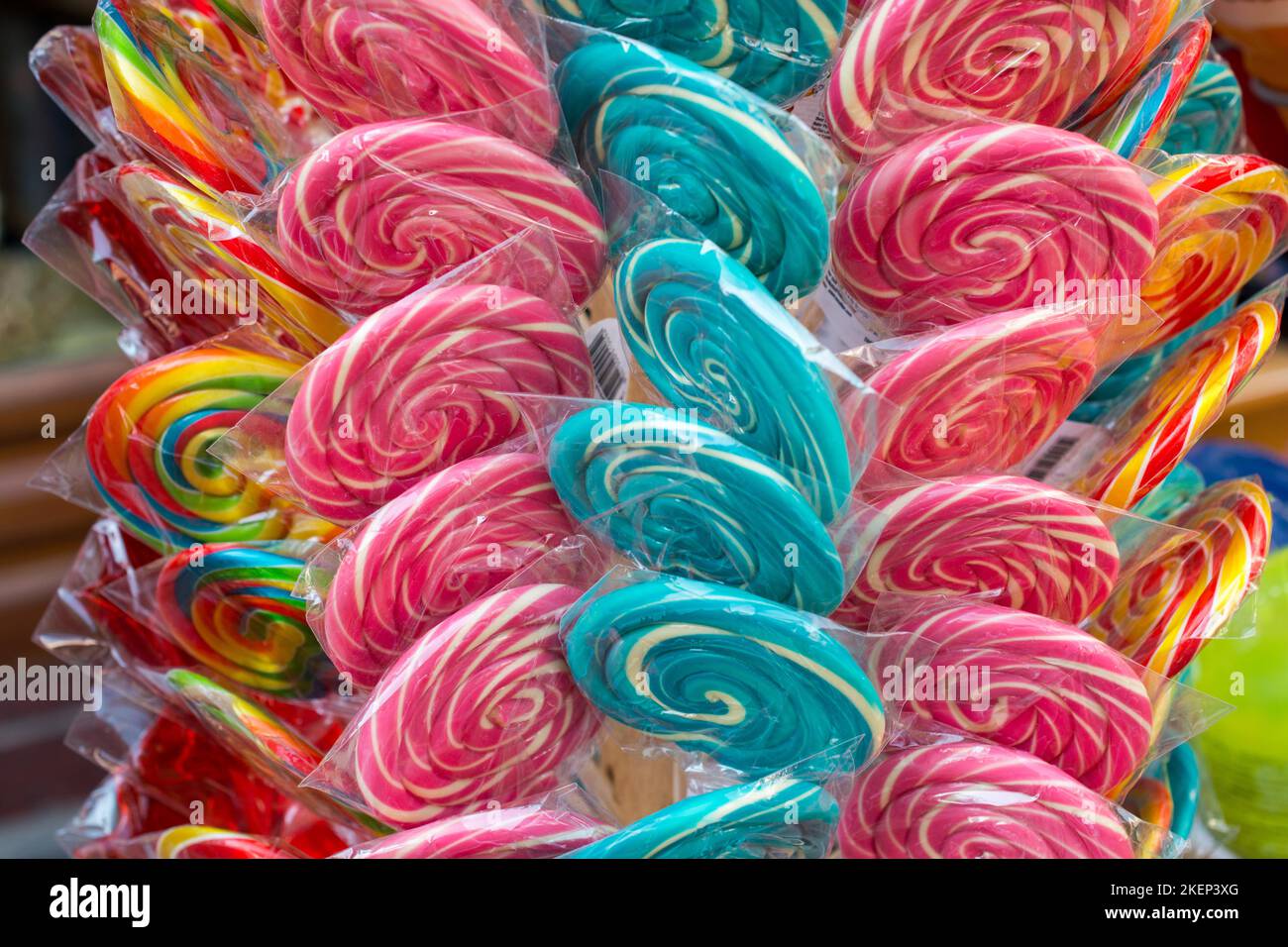 Delicious colorful swirl candy and sweets for kids Stock Photo - Alamy