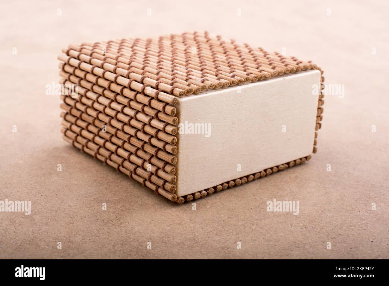 Little Straw wooden box of light brown color Stock Photo - Alamy