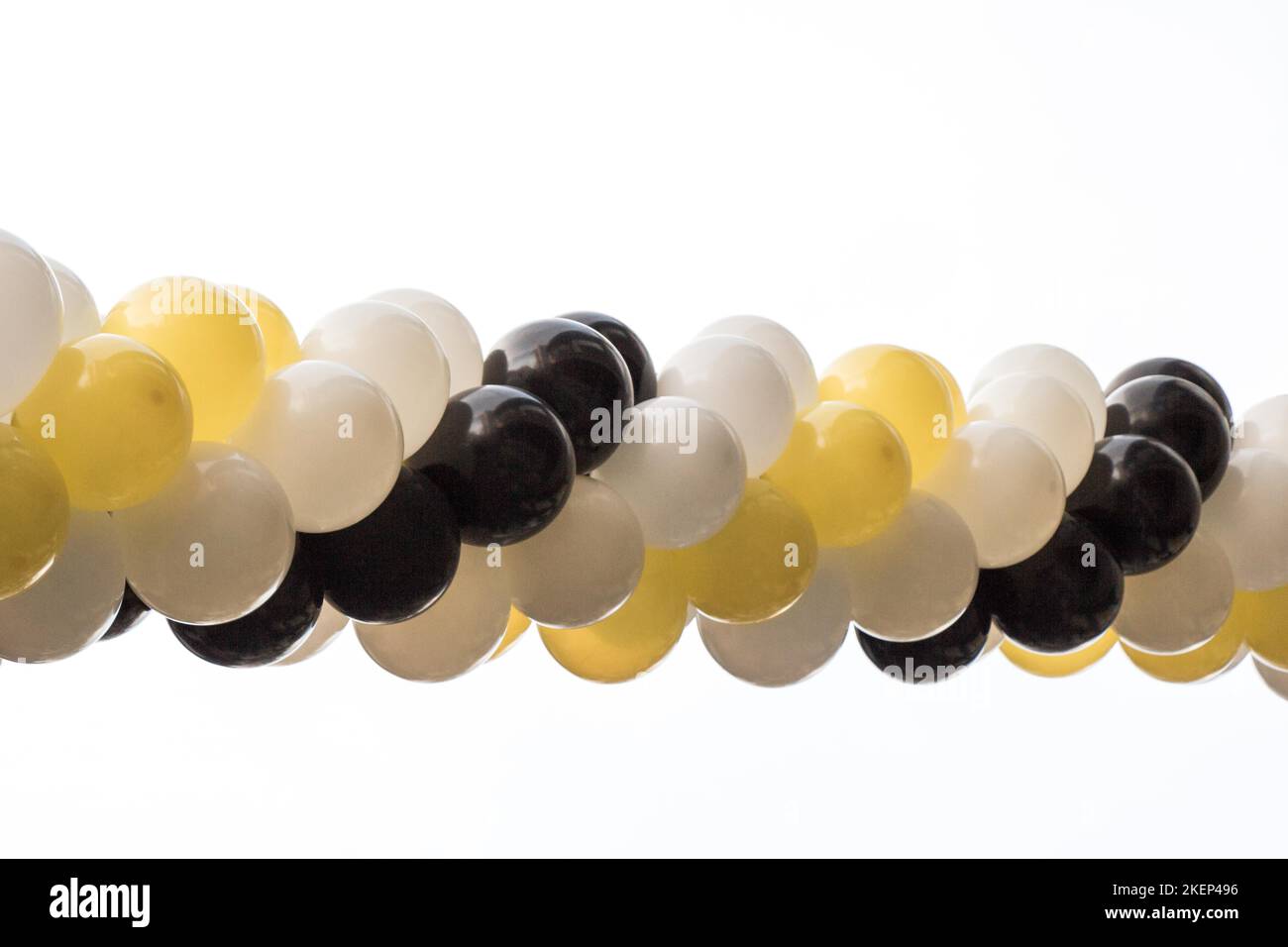 Colorful balloons in air between trees Stock Photo - Alamy