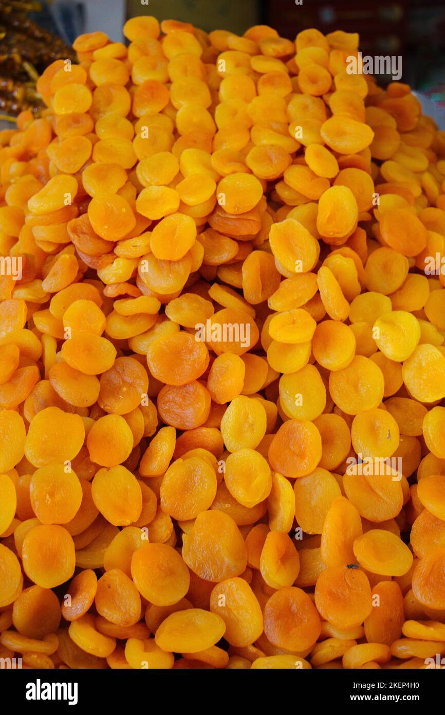 Dried apricot fruit as a whole background texture Stock Photo - Alamy