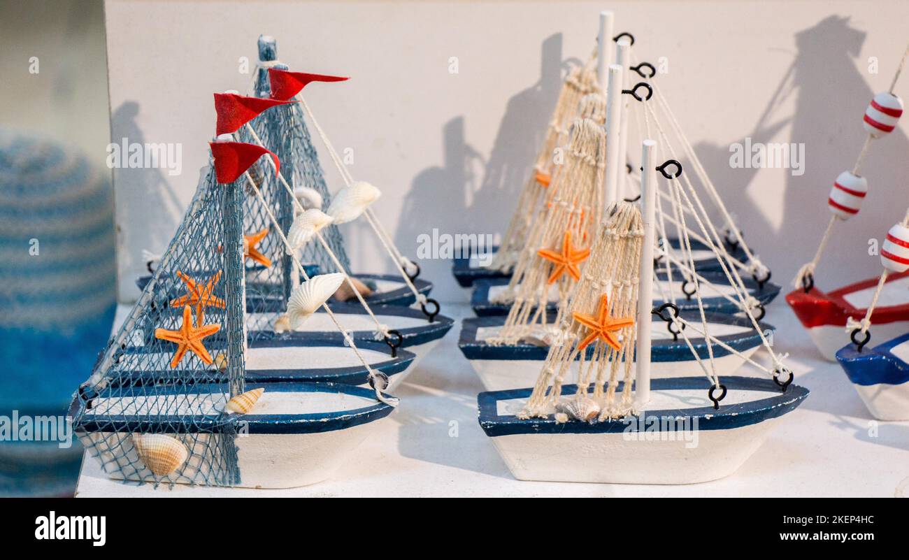 Set of small colorful model boats Stock Photo - Alamy