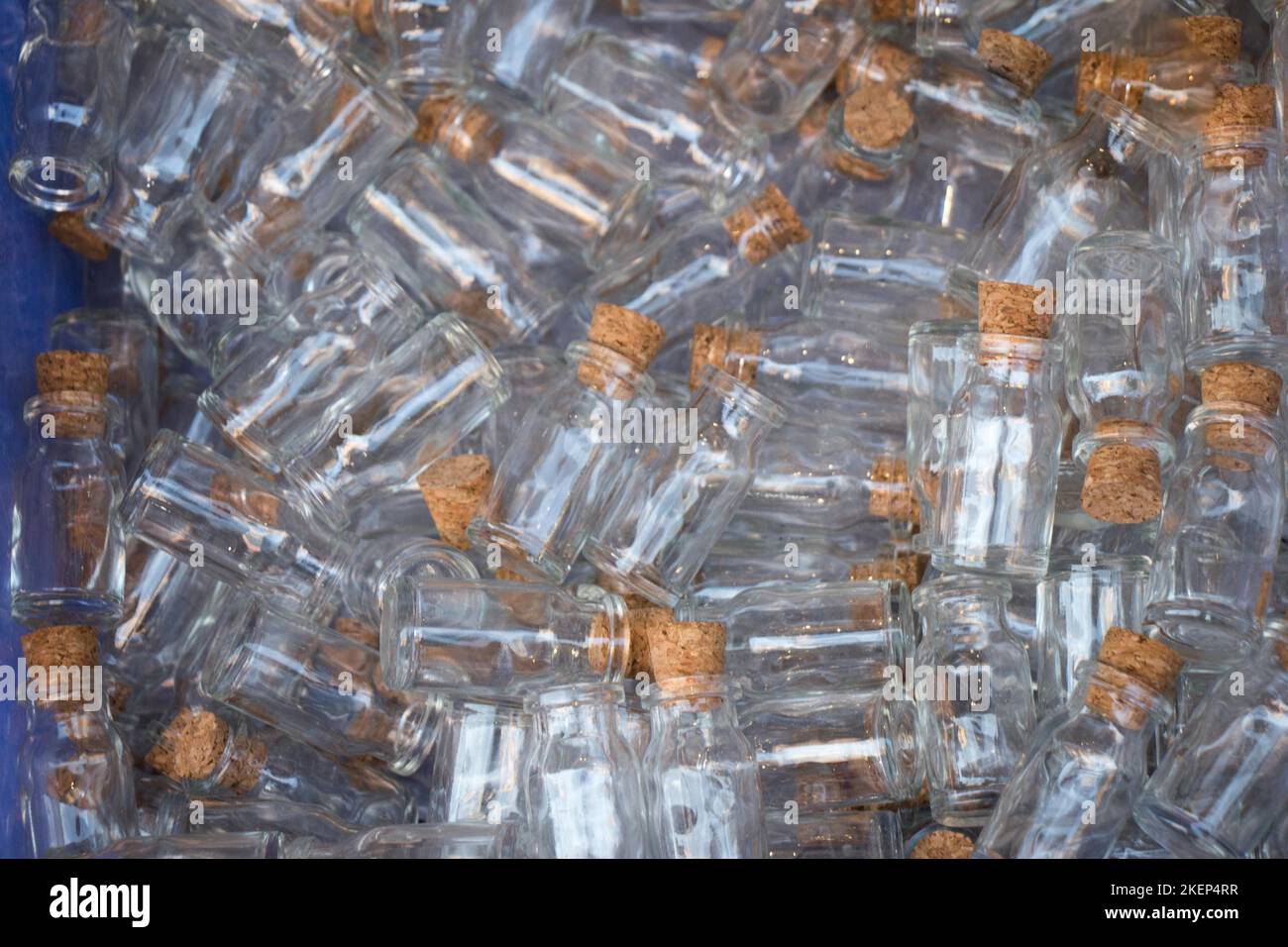Set of Empty small transparent bottles in a box Stock Photo - Alamy