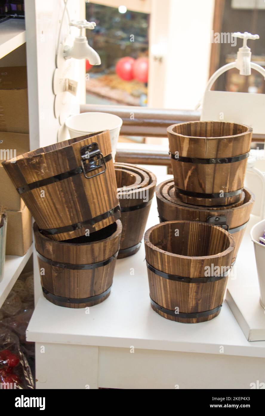 Set of buckets made of wood in a market place Stock Photo - Alamy