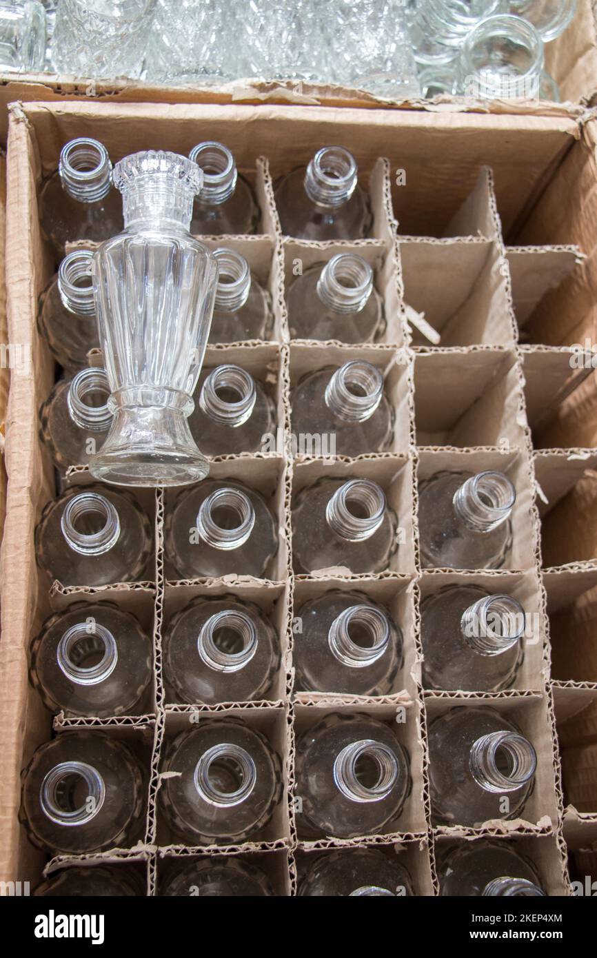 Set of Empty small transparent bottles in a box Stock Photo - Alamy