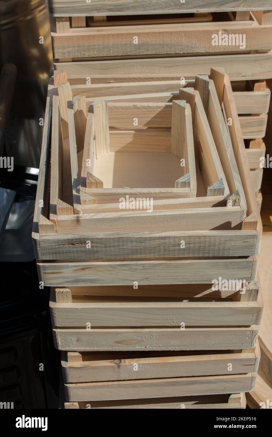 Wooden empty crate box for sale in a market Stock Photo - Alamy