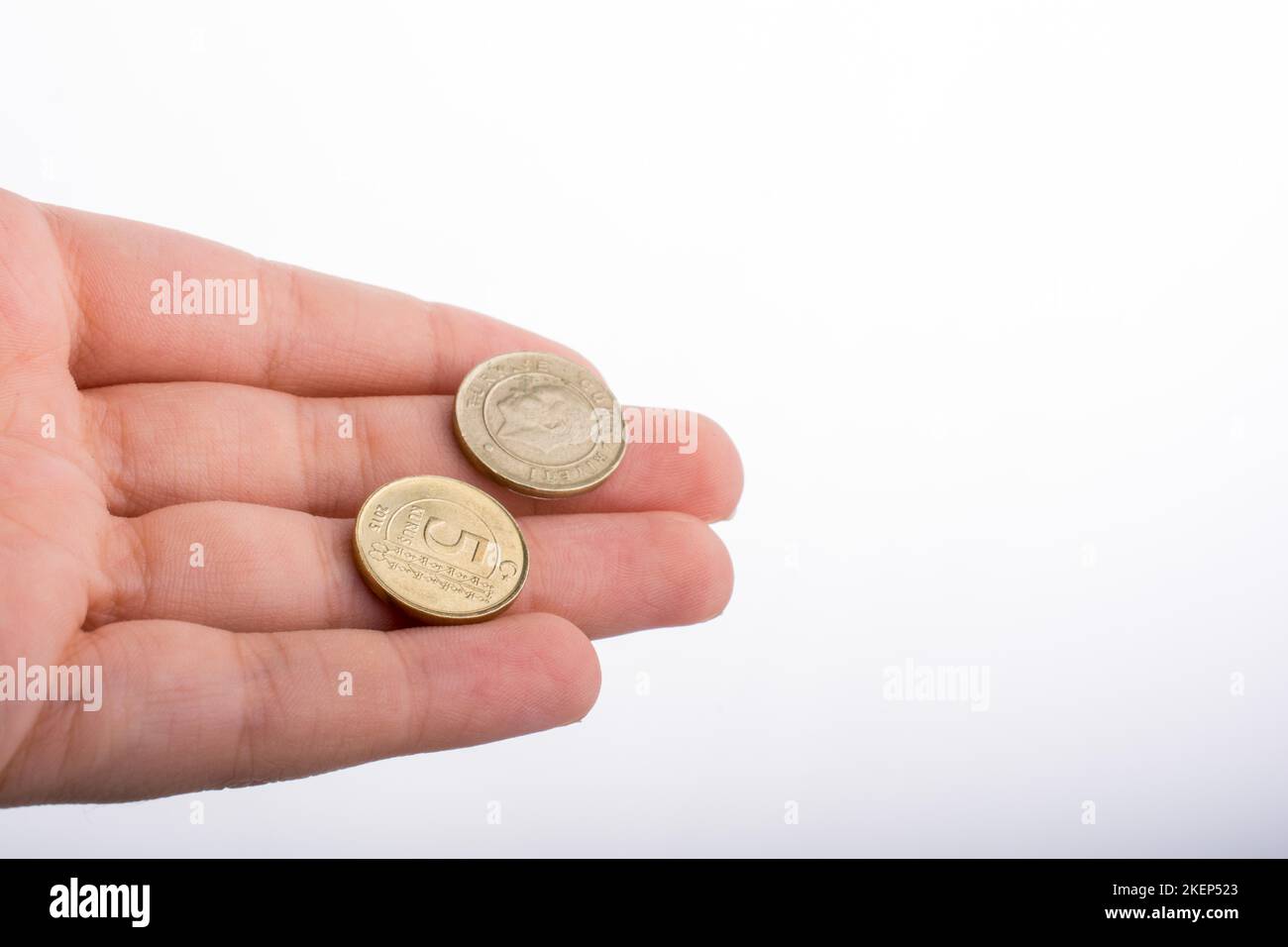 Hand handing money on a white bakground Stock Photo - Alamy