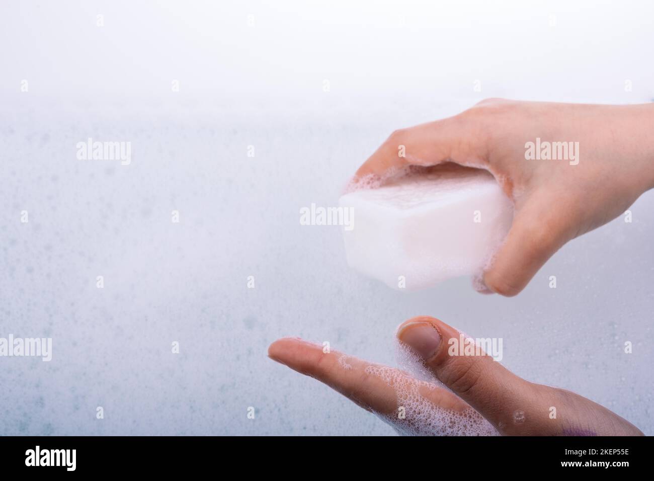 Hand washing and soap foam on a foamy background Stock Photo - Alamy
