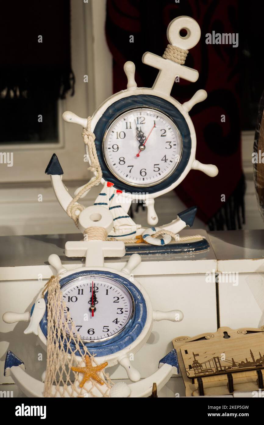 Clock in the shape of a steering wheel Stock Photo - Alamy