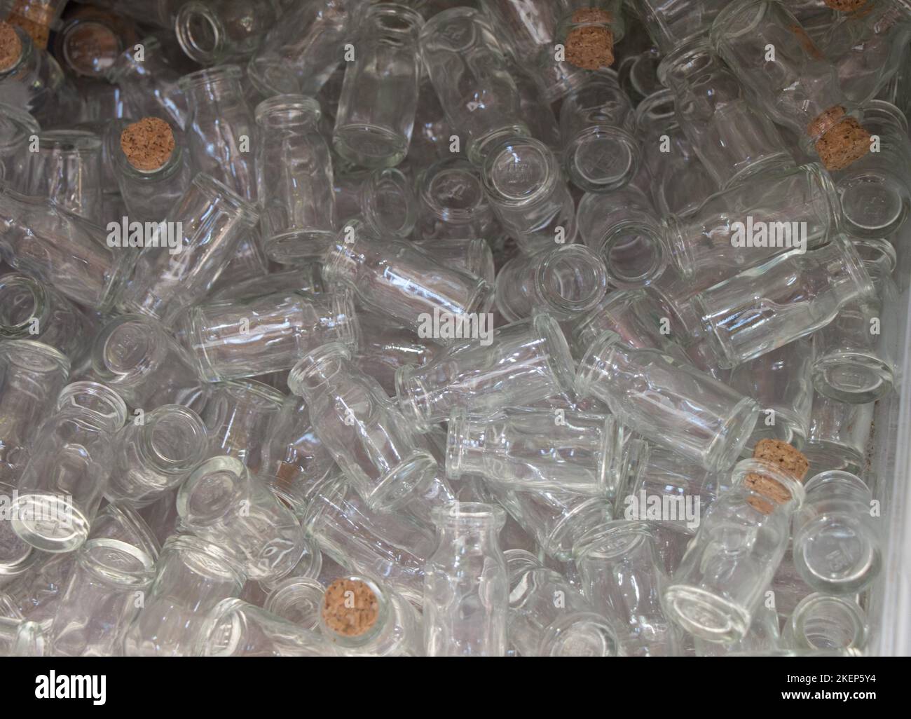 Set of Empty small transparent bottles Stock Photo - Alamy