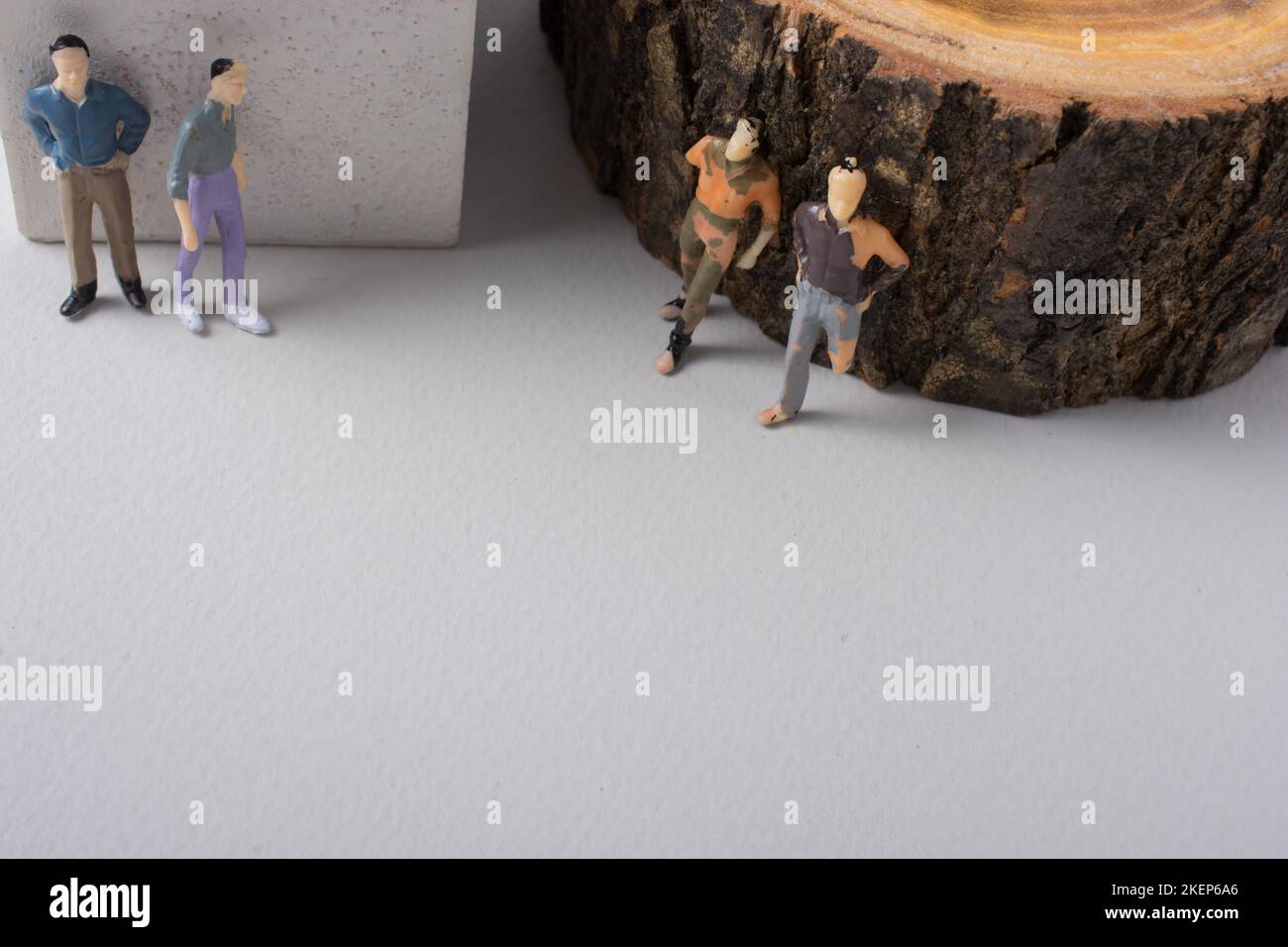 Tiny figurine of man miniature before a house and a tree Stock Photo ...