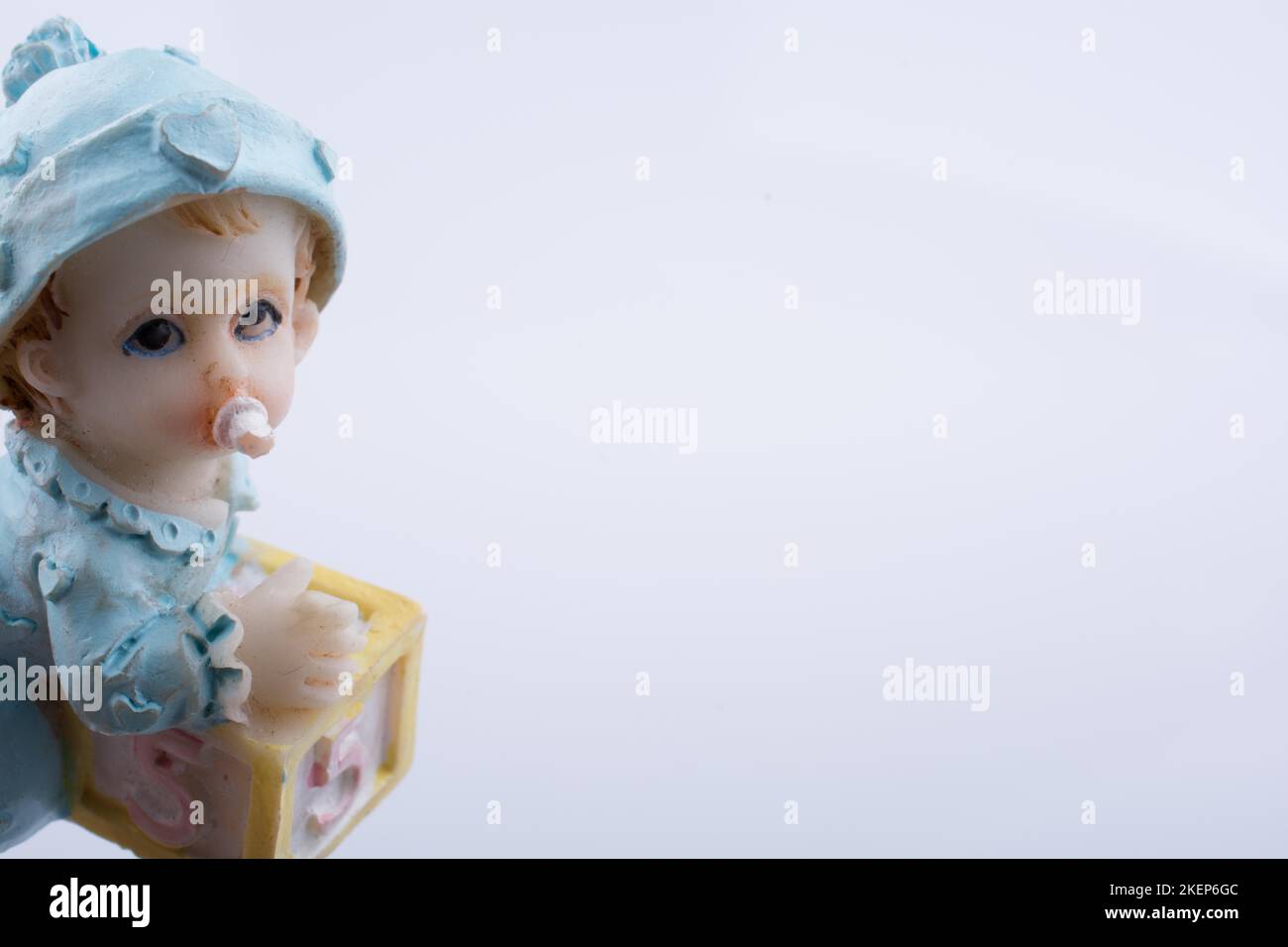 Little baby figure on a white background Stock Photo - Alamy