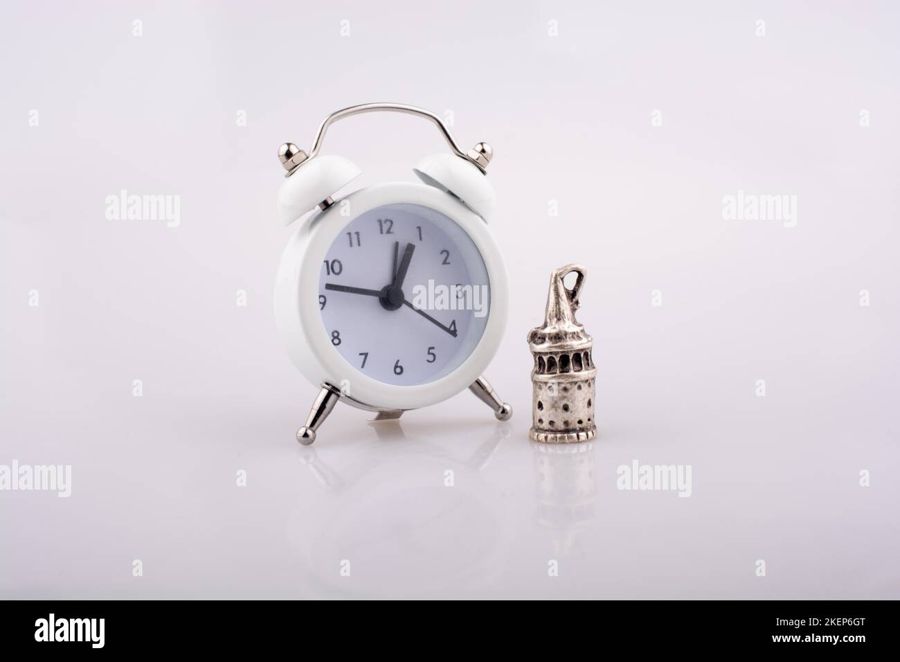White color alarm clock on white background Stock Photo - Alamy White color alarm clock on white background Stock Photo - Alamy