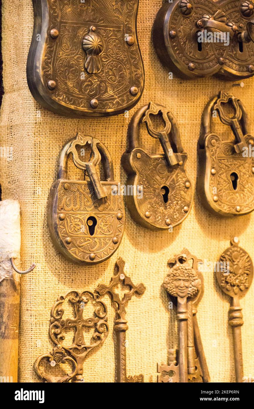 Retro styled keys and locks are hanging on a wall Stock Photo - Alamy