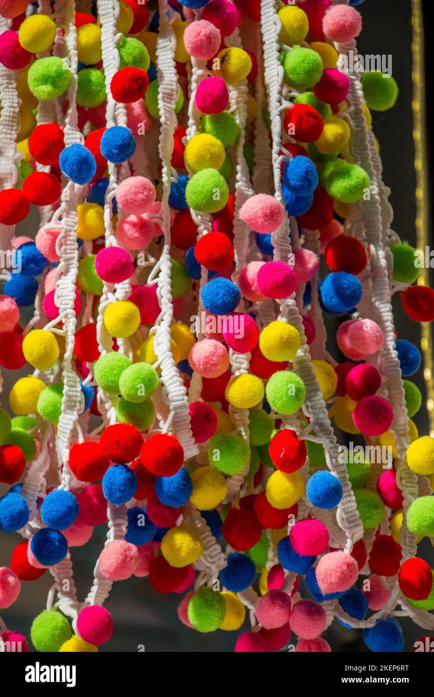 Set of the colorful pompoms in the bazaar Stock Photo - Alamy