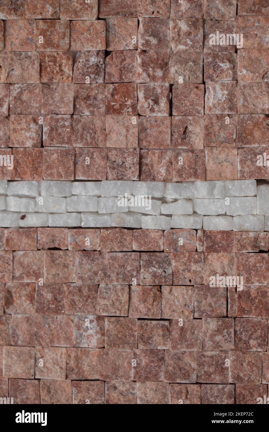 Decorative cubic stone wall as background texture Stock Photo - Alamy