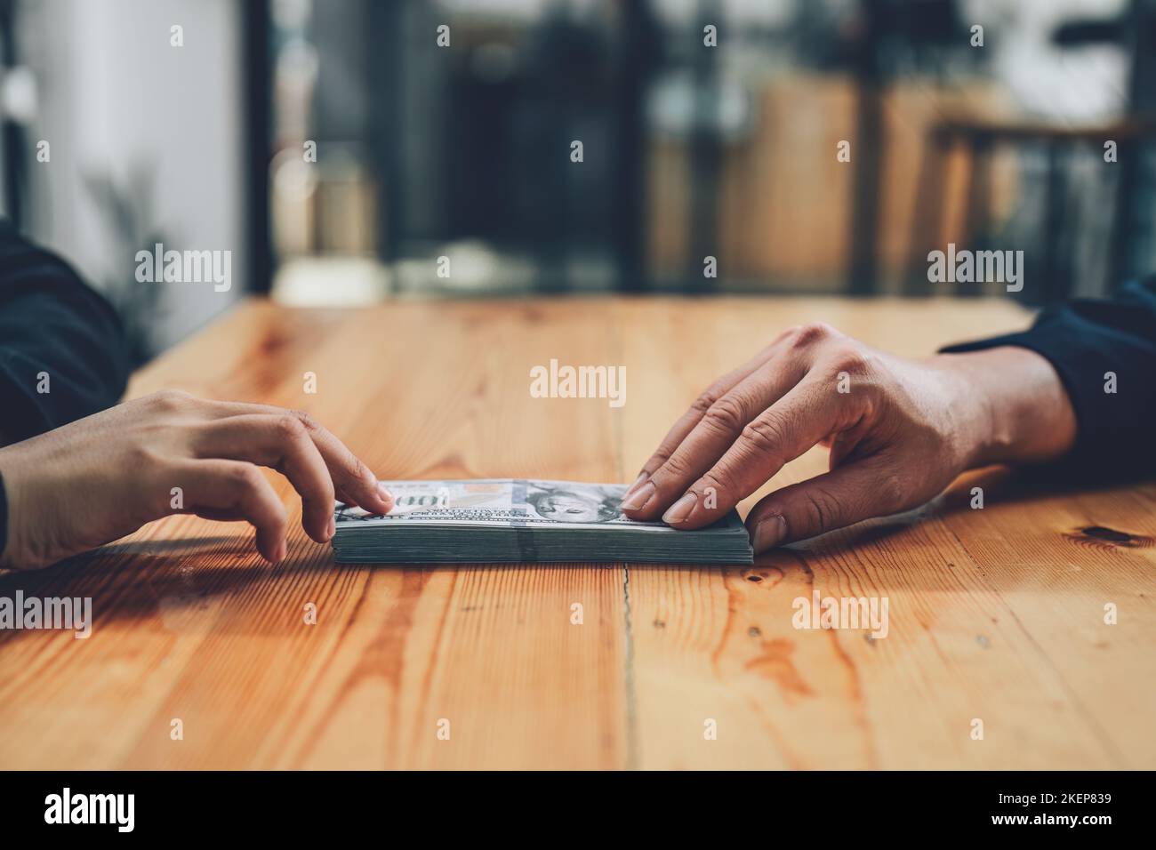 Handing over money hi-res stock photography and images - Alamy