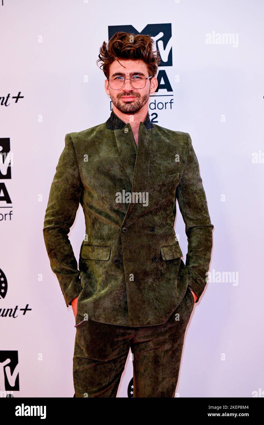 Chris Taylor attending the 2022 MTV EMAs at the PSD Bank Dome in ...
