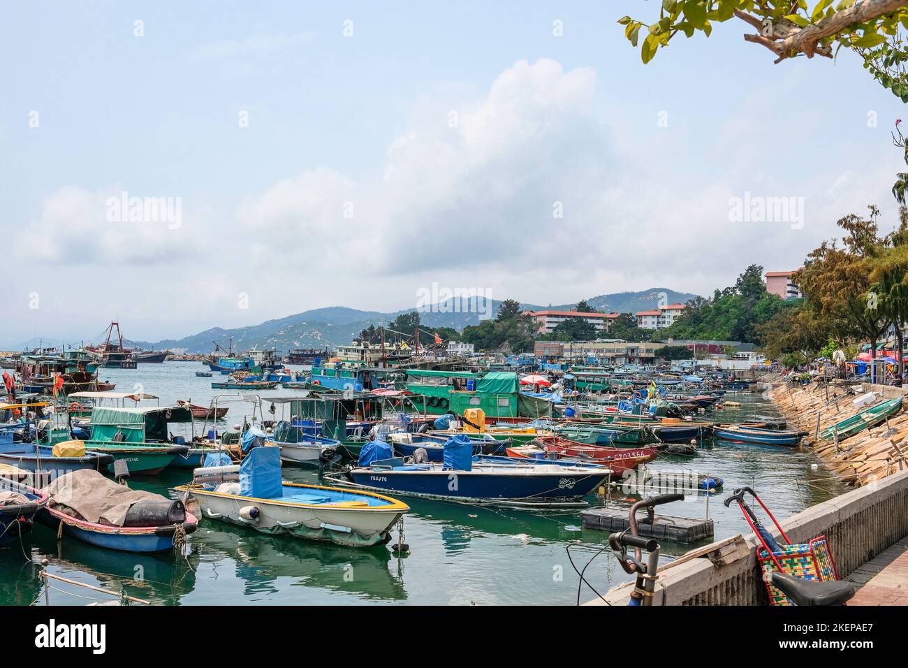 Colourful fishing boats docked at the pier — Cheung Chau Harbour ...