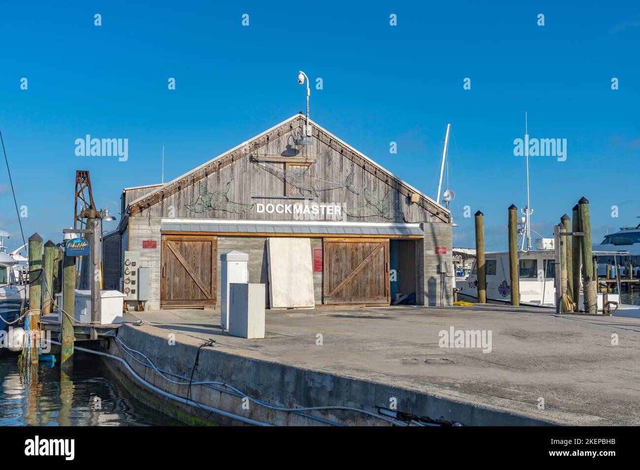 A rustic wooden dockmasters building in the historic seaport of Key ...