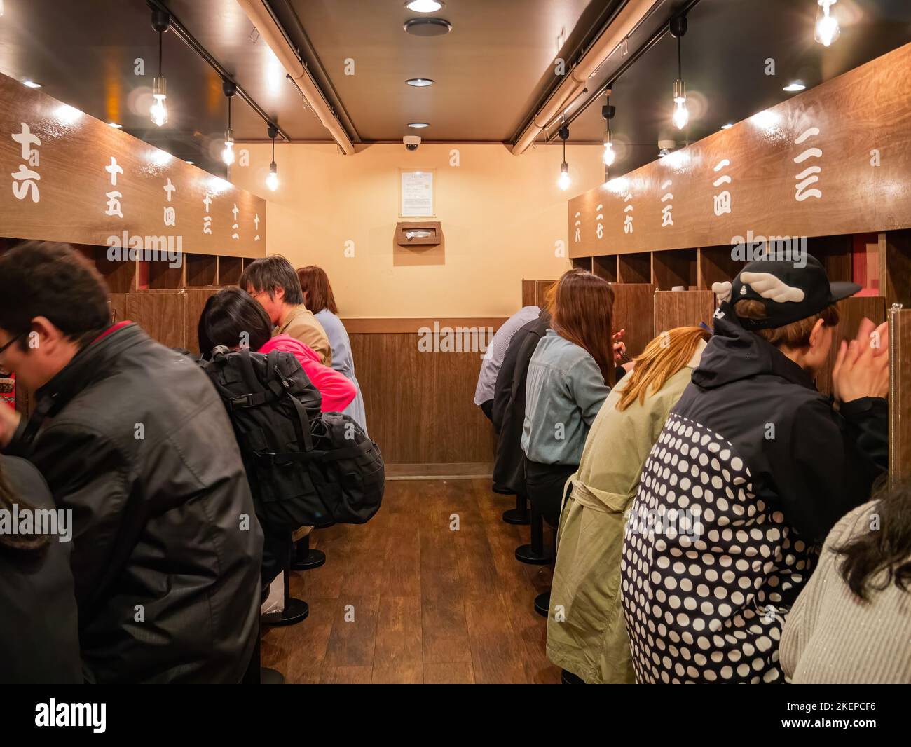 Tokyo, APR 3 2013 - Close up shot of many people eating in Ichiran ...
